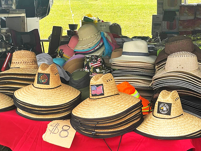 A sea of straw hats with patriotic patches—practical sun protection that doubles as a souvenir of Blue Ridge summer adventures.