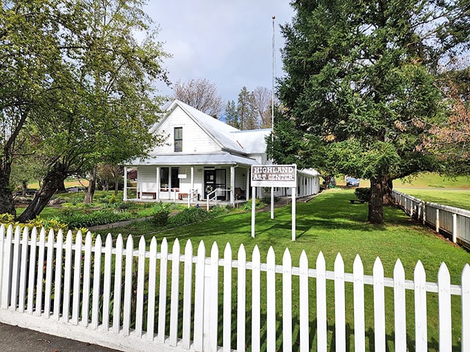 The Highland Art Center's white picket fence isn't just for show—it frames a community hub where creativity thrives far from urban galleries.