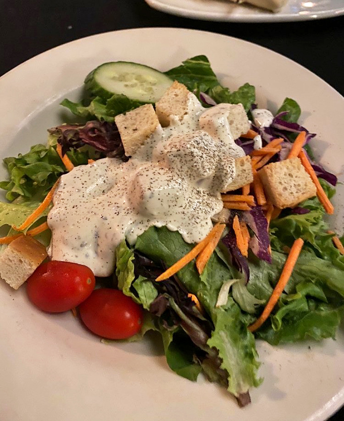 Even the house salad gets the royal treatment—fresh greens, vibrant veggies, and croutons that weren't born in a box.