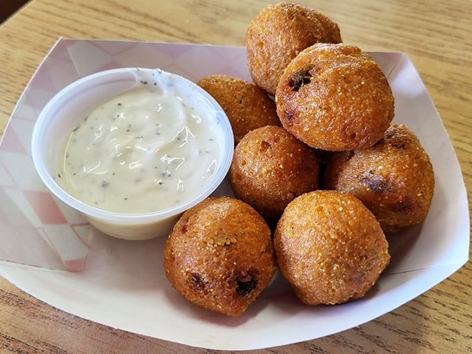 Hush puppies that would make any Southerner nod in approval—crispy outside, fluffy inside, and impossible to eat just one.
