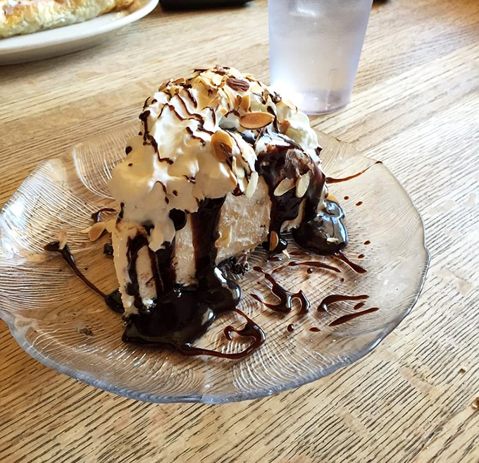 Not just dessert—it's therapy on a plate. This ice cream pie with chocolate drizzle makes adult problems temporarily disappear.
