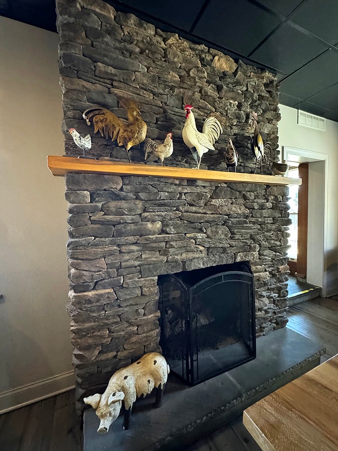 The stone fireplace crowned with rooster figurines adds farmhouse charm. In barbecue, as in life, it's the unexpected touches that make a place memorable.