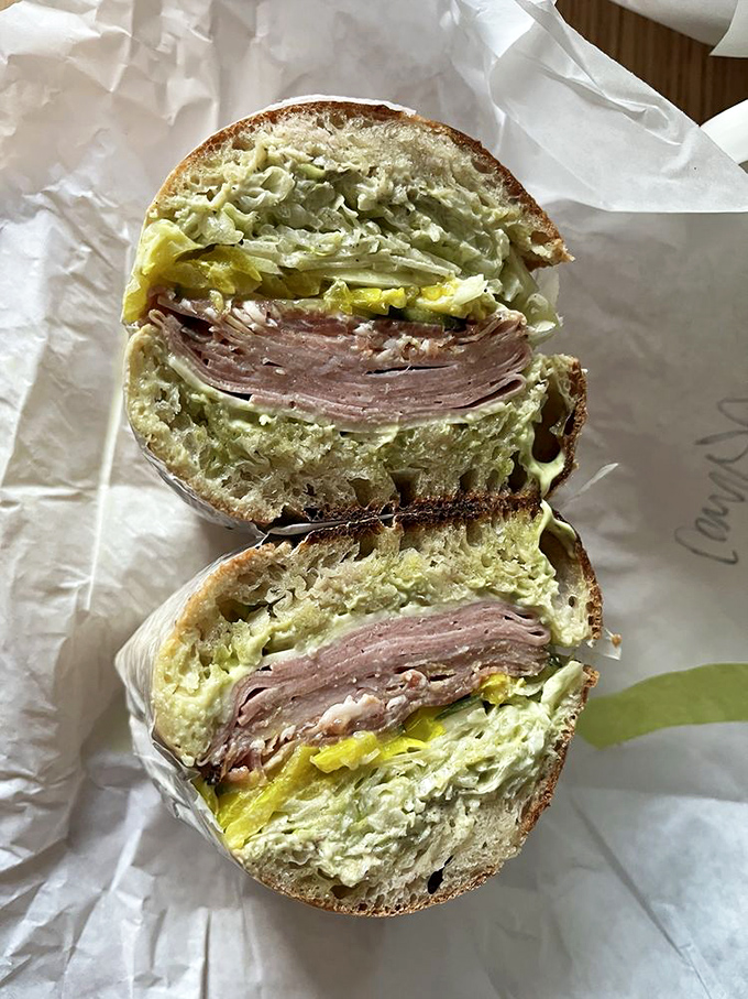 This Italian combo sandwich isn't playing around—layers of meat, cheese, and pickled vegetables create a masterpiece between bread. Worth cheating on pizza for.