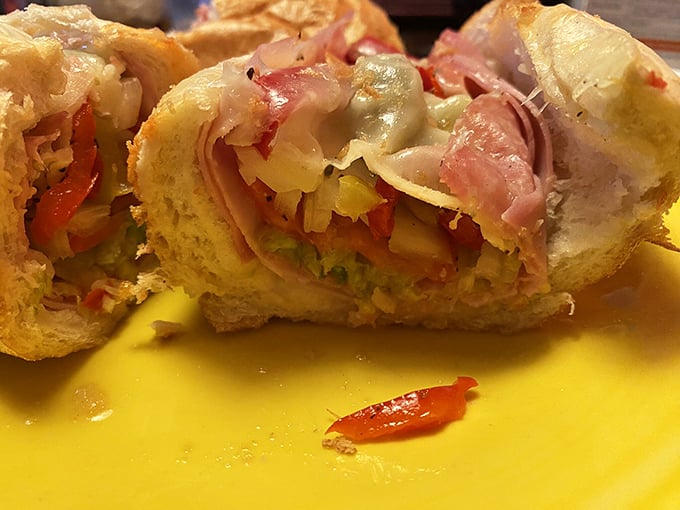 The Italian hoagie—a stratified geology of meats, cheese, and veggies that makes you wonder why sandwiches ever evolved beyond this perfection.