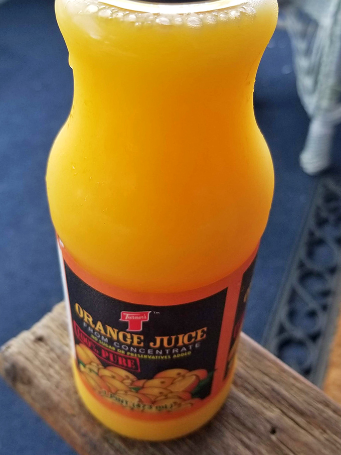 Orange juice so vibrant it practically glows, promising a vitamin boost to balance out that donut you're definitely going to eat.