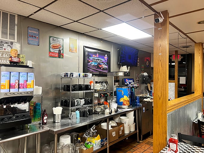 The beating heart of any great diner – a kitchen setup that's seen thousands of orders and never lost its rhythm.
