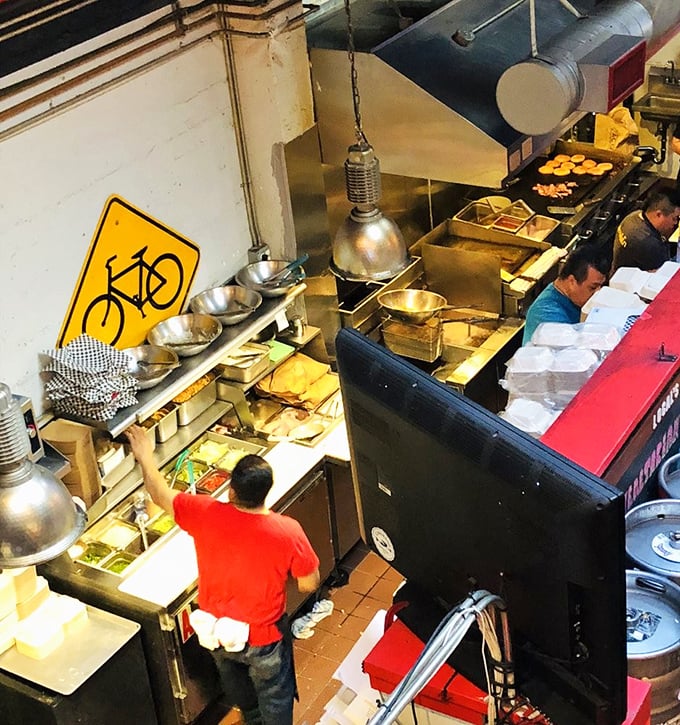 The kitchen crew working their magic – like watching a well-rehearsed band hit every note perfectly.