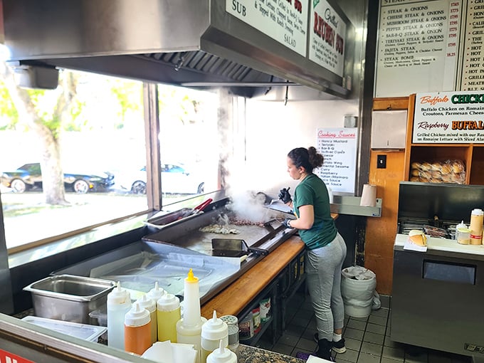 Where the magic happens – steam rising from the grill as another sandwich masterpiece takes form. The kitchen ballet is mesmerizing.