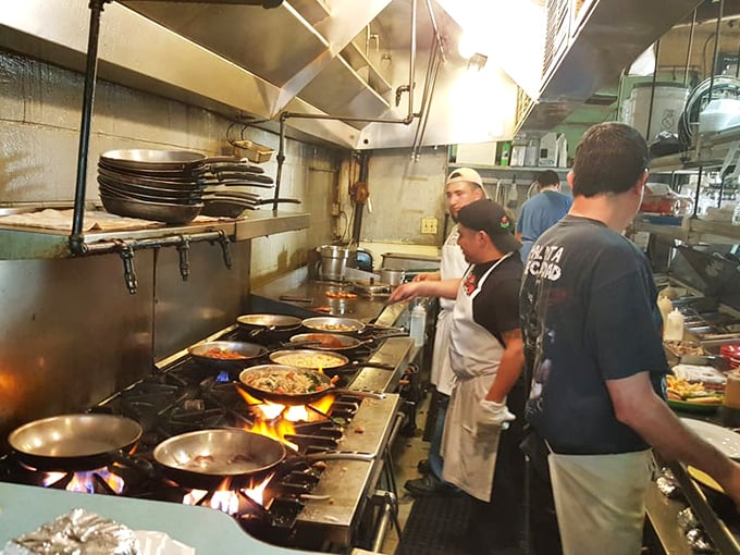 Where the magic happens – Starliner's kitchen crew orchestrates a symphony of sizzles and spices behind the scenes.