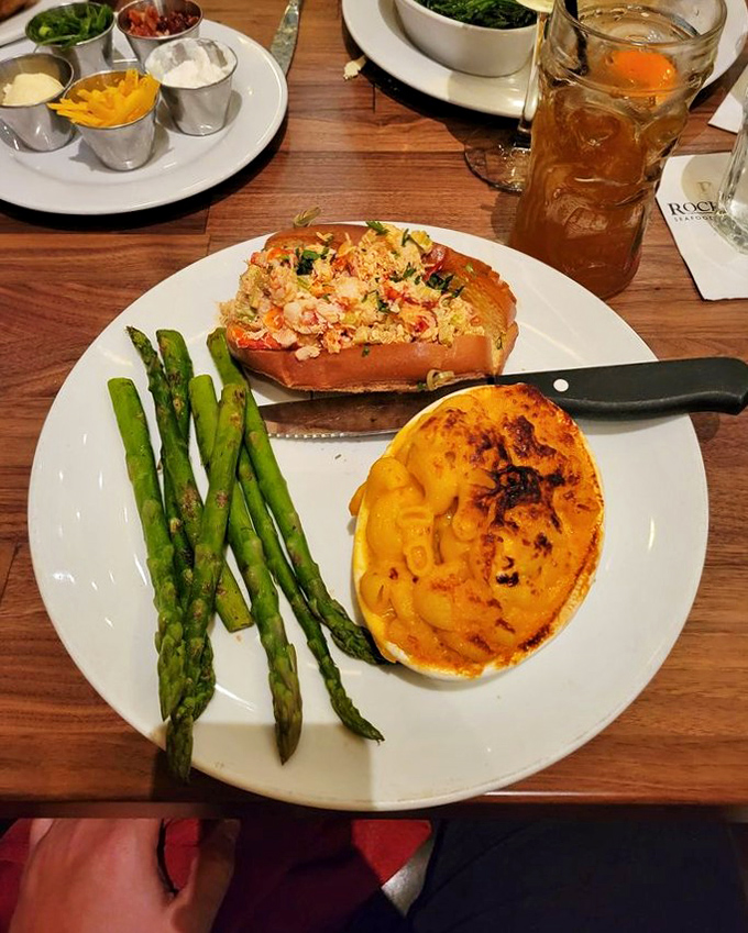 This isn't just a lobster roll—it's summer in New England transported to Southern California, with sweet lobster meat nestled alongside perfectly grilled asparagus.