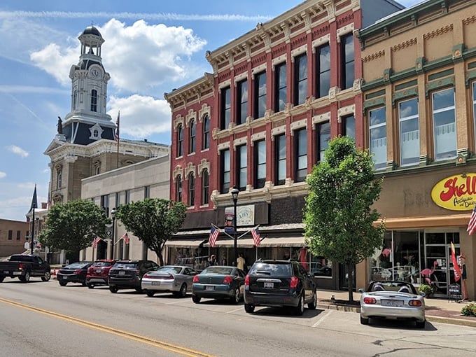 Downtown Greenville's historic storefronts create a vibrant streetscape where local businesses thrive under the watchful eye of the courthouse clock tower.