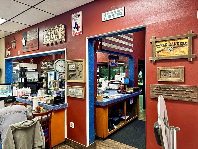 The command center where BBQ magic happens. Those Texas-themed decorations aren't just for show—they're credentials.