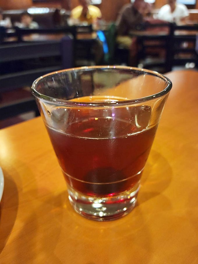 A perfectly crafted Manhattan – because sometimes the best accompaniment to slow-cooked ribs is a cocktail that's equally unhurried in its perfection.