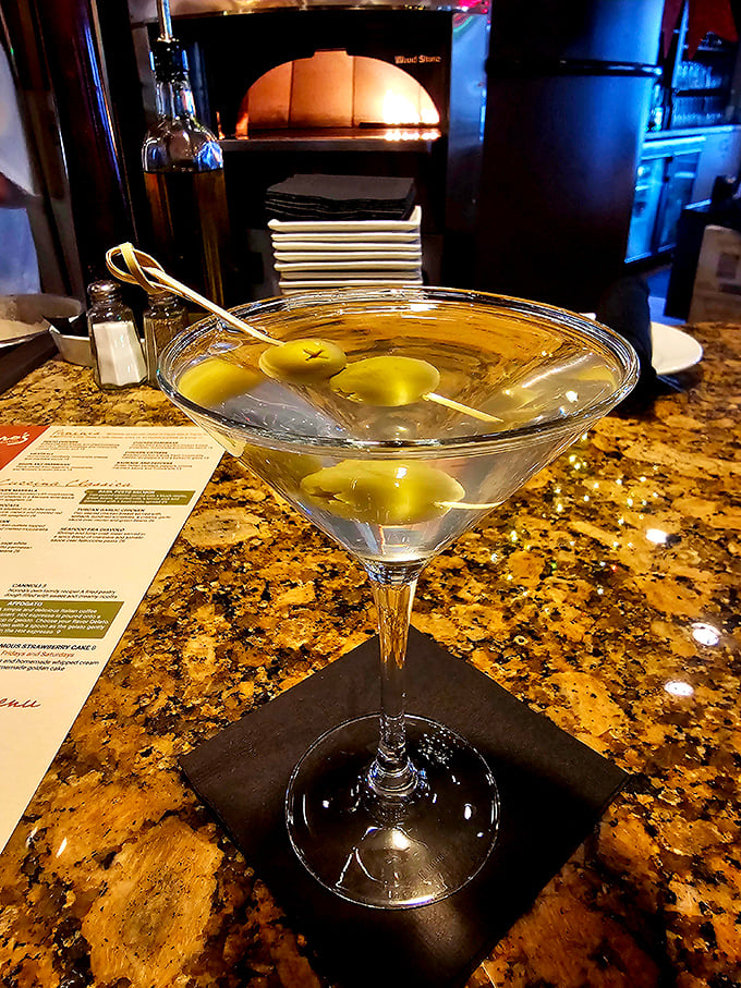 A martini so classic and pristine it could teach a masterclass in cocktail elegance—those olives are just showing off.