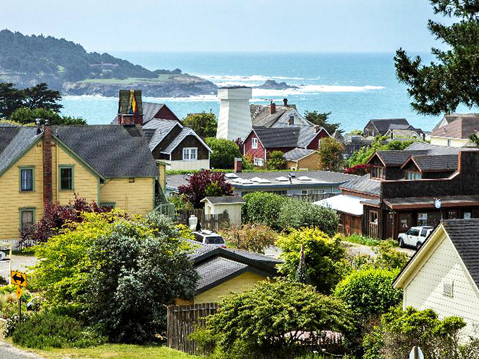 A village where every roofline frames an ocean view, making even the most ordinary morning coffee feel like a luxury resort experience.