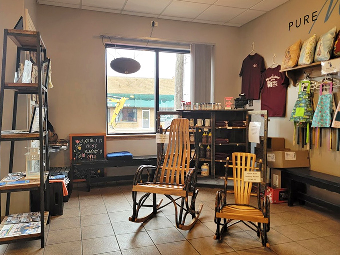 A cozy corner for browsing local wares. Those rocking chairs aren't just furniture—they're an invitation to slow down and stay awhile.