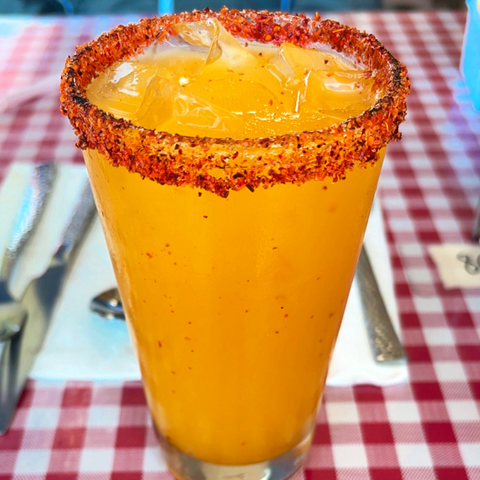 A spicy Michelada with its chili-salt rim—proof that even breakfast drinks deserve a little California kick to wake up the taste buds.