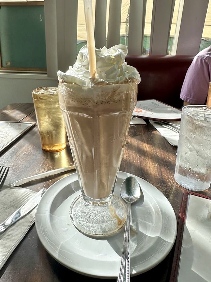 This milkshake isn't just thick—it's the reason straws were invented. A proper diner shake that stands at attention and demands to be appreciated.