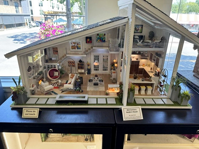 Mid-century modern goes miniature in this dollhouse that looks like it was decorated by a very small Don Draper with impeccable taste. 