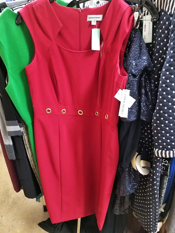 That red dress knows exactly what it's doing, hanging there like a siren song for special occasions.