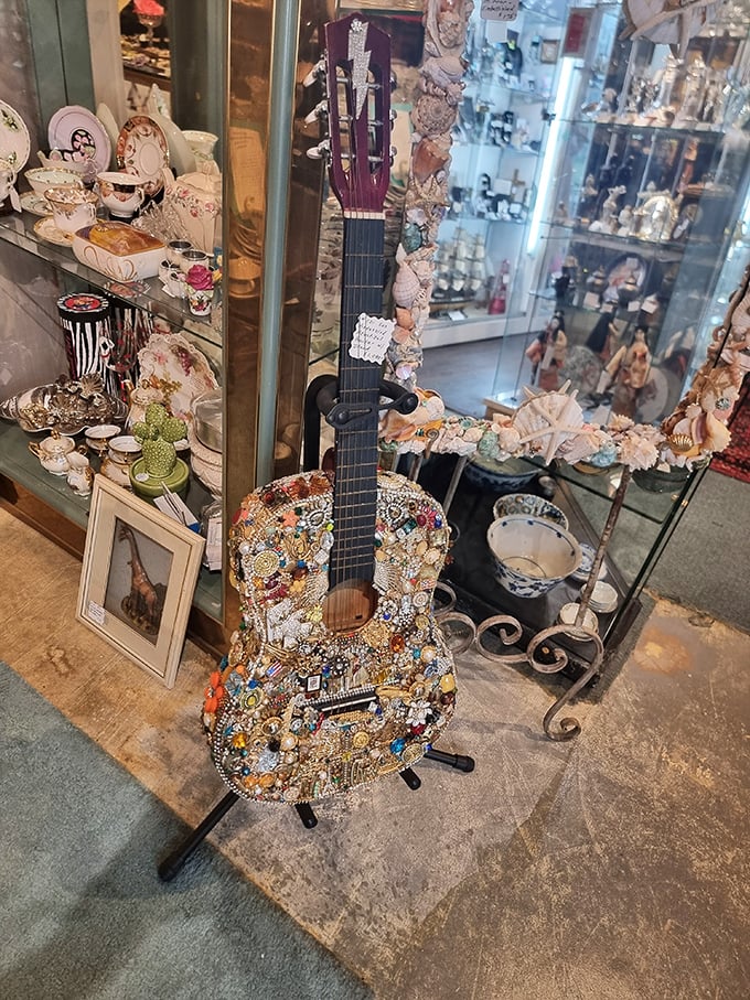 This isn't just a guitar—it's a bedazzled autobiography, each jewel and trinket telling a story only its creator fully understands.