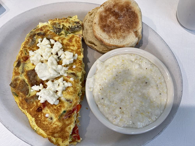 An omelet that's clearly been to college—sophisticated, well-rounded, and topped with feta cheese that adds just the right amount of Mediterranean flair.