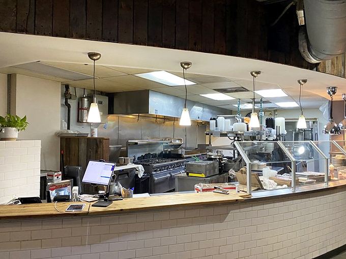 Where the magic happens – an open kitchen that performs culinary theater with Southern classics as the starring roles.
