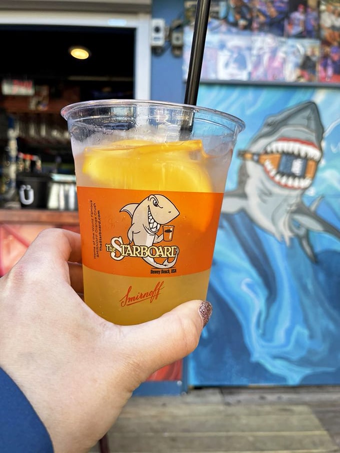 The legendary Orange Crush—summer distilled into a glass where vodka and fresh-squeezed orange juice create the kind of vacation memory that lasts all winter. 