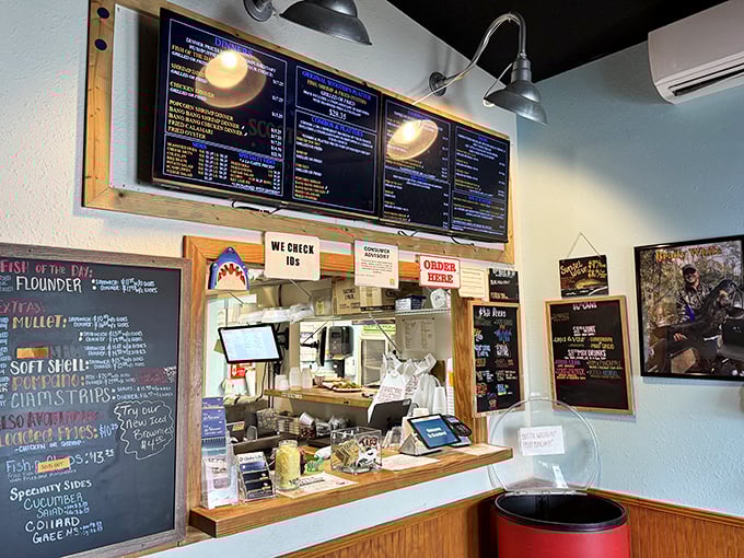 The ordering window – that magical portal where dreams of fresh-caught deliciousness become reality. Like Willy Wonka's factory, but for seafood lovers.
