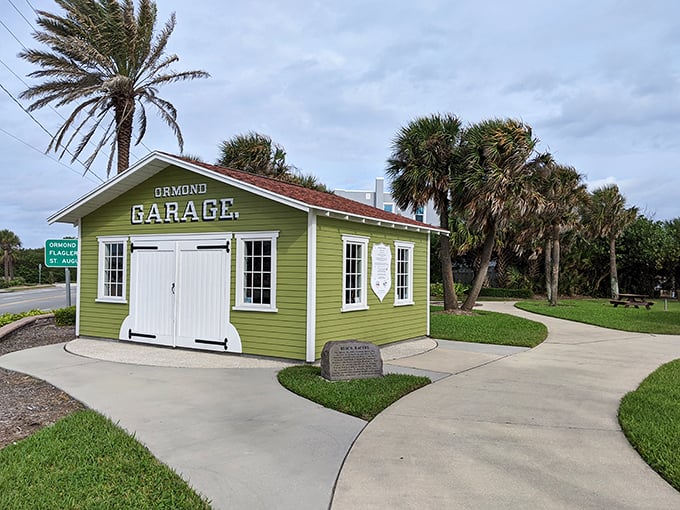 The historic Ormond Garage, painted a cheerful green, preserves the town's racing heritage while looking like the world's most charming garden shed.