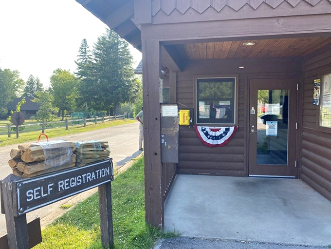The park office welcomes with rustic charm. That patriotic bunting isn't just decoration—it's Wisconsin pride on full display.