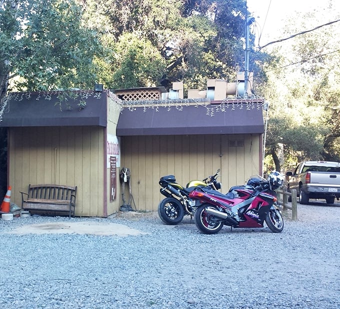 Even the motorcycles look happy to be here. The gravel parking lot is often home to everything from Harleys to Bentleys.