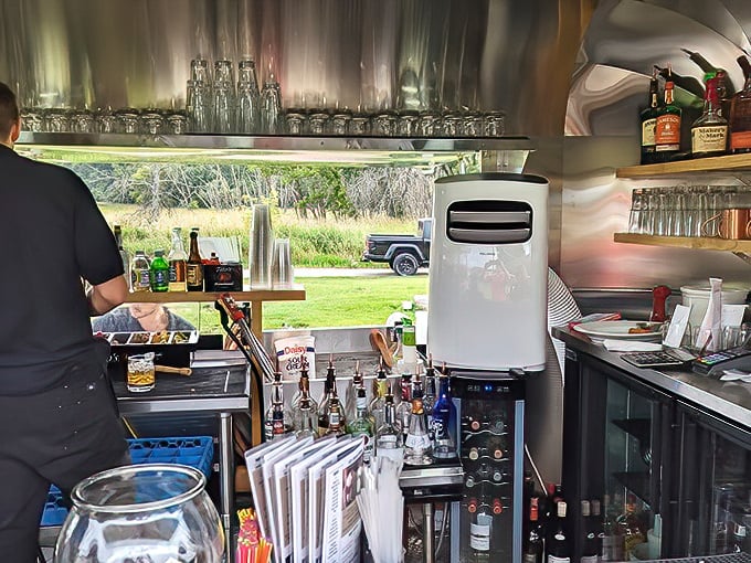 Where bartending meets performance art. This outdoor bar setup proves that fresh air makes everything taste better—even perfection.