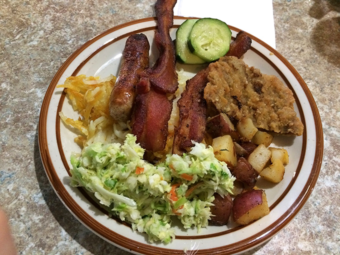 A plate that says "I'm not counting calories today"—crispy bacon, golden potatoes, and enough comfort food to fuel a small hiking expedition.