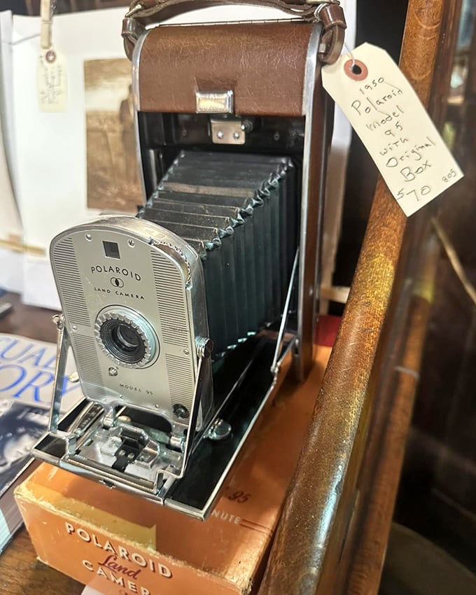 A pristine Polaroid with its original box—the Instagram of its day, delivering instant gratification when "wait an hour for photo development" was the norm.