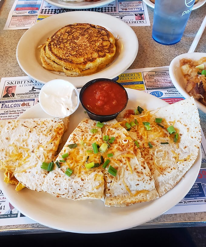 Quesadillas and pancakes sharing a plate like old friends—proof that breakfast and lunch boundaries were meant to be deliciously blurred.