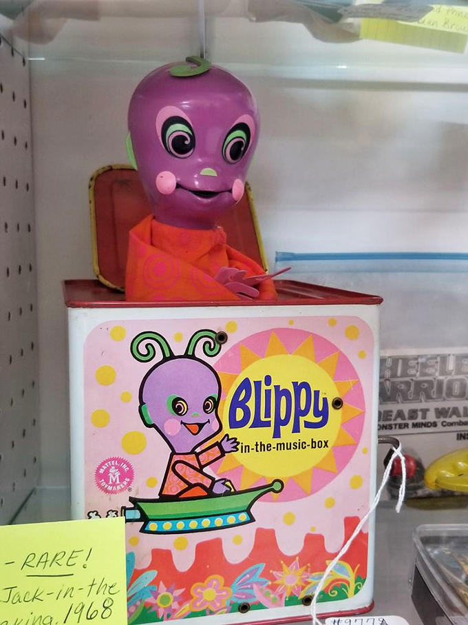 Blippy the alien jack-in-the-box proves that even the toys of yesterday were delightfully weird. Those cheeks! That color! Pure 1960s psychedelic joy. 
