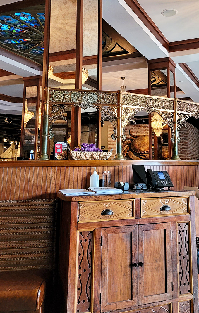 Elegant woodwork and vintage details at the host stand – first impressions matter, even in a place where you'll soon be elbow-deep in crab.