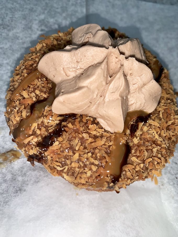 Caramel, chocolate, toasted coconut, and cream – a donut that's clearly overachieving and making all the other pastries jealous.
