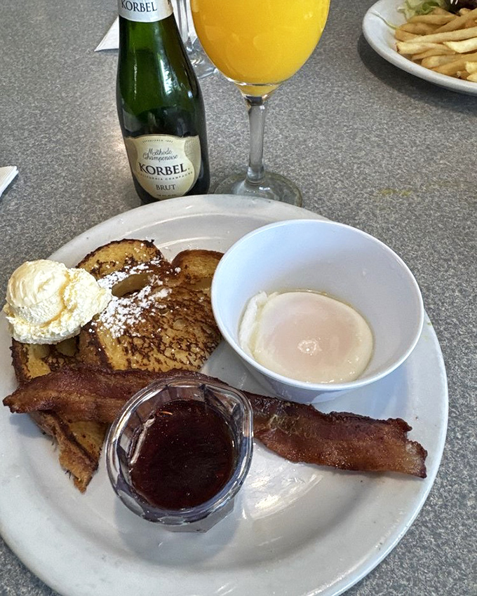 French toast, bacon, and mimosas—the holy trinity of brunch that proves breakfast is actually the most important meal of the day.