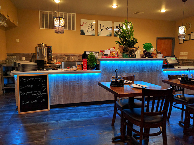 The counter glows with blue light, a modern beacon guiding hungry travelers to their dim sum destination.
