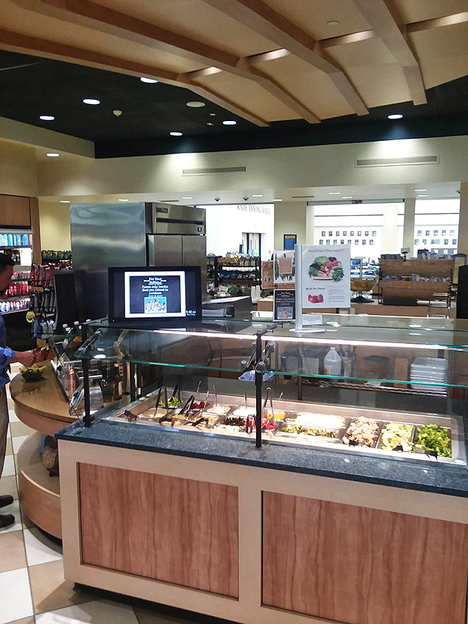 The compact service counter where BBQ dreams are born. Small space, enormous flavors—proof that greatness doesn't require square footage.