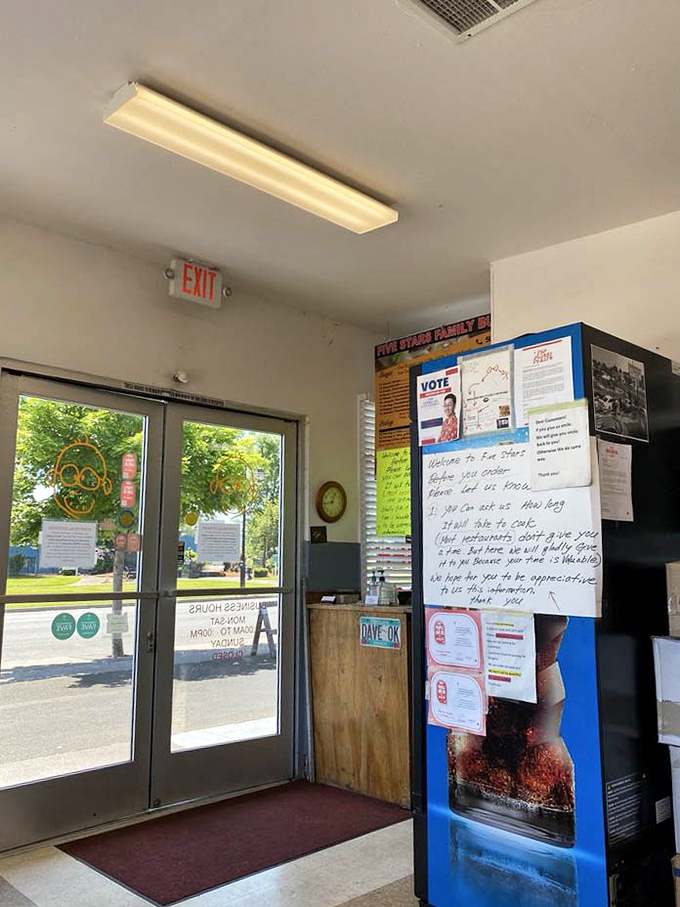 The entrance welcomes you with handwritten notes and community announcements – the hallmark of a true local establishment that values connection.