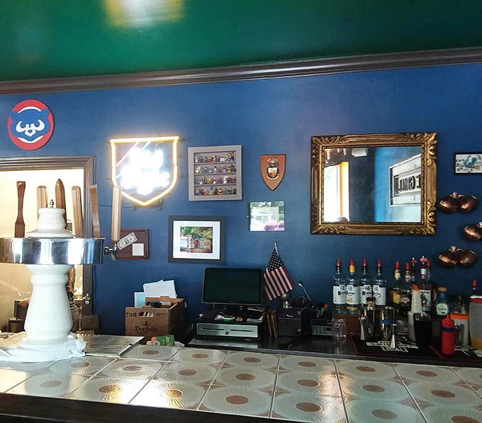 The bar area, with its blue walls and eclectic décor, feels like the coolest corner of your most interesting friend's house.