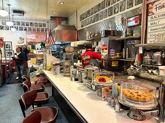 That counter with its row of classic stools isn't just functional—it's the stage where milkshake magic happens in full view of an appreciative audience.