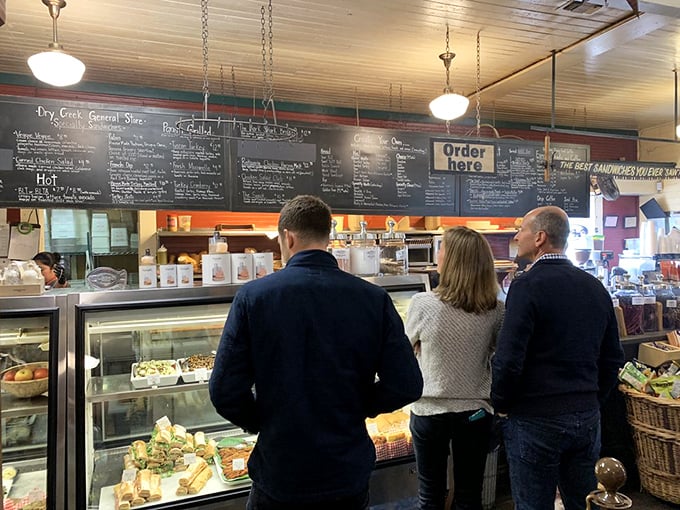 The ordering counter where sandwich dreams become edible reality, one Dutch crunch at a time.