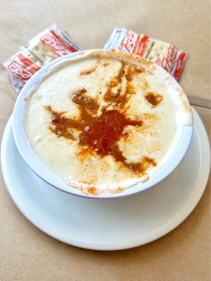 Cream of crab soup with that telltale Old Bay swirl—liquid gold that warms the soul and prepares the palate.