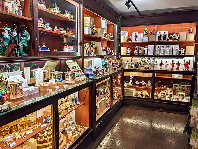 Glass cabinets house treasures that would make Willy Wonka trade chocolate for Christmas collectibles—each shelf a new discovery.