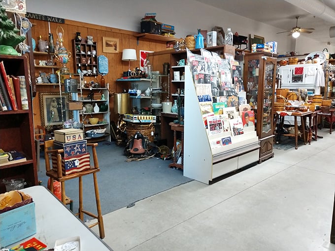 Americana abounds in this vendor space, where patriotic treasures share shelves with vintage lamps and collectibles. Norman Rockwell would feel right at home here.
