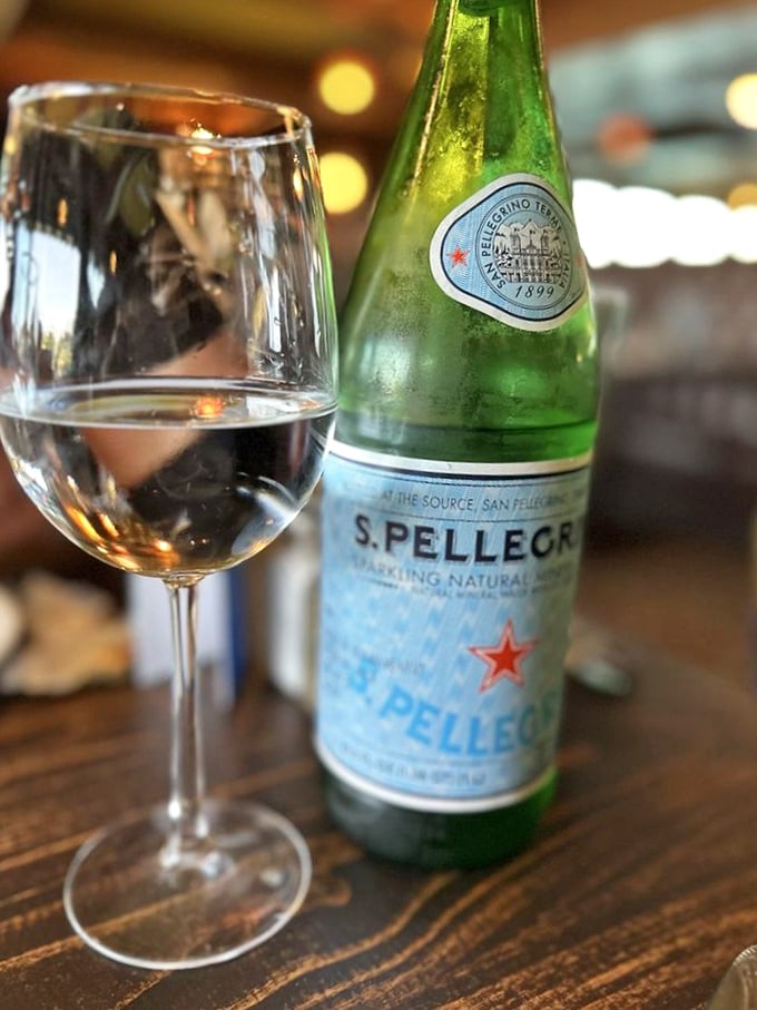 Even the water service feels special – San Pellegrino alongside stemware that makes you sit up straighter and pretend you know about wine regions.